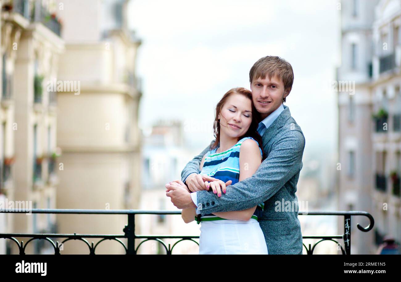 Beautiful couple hugging at viewpoint on Montmartre in Paris Stock ...