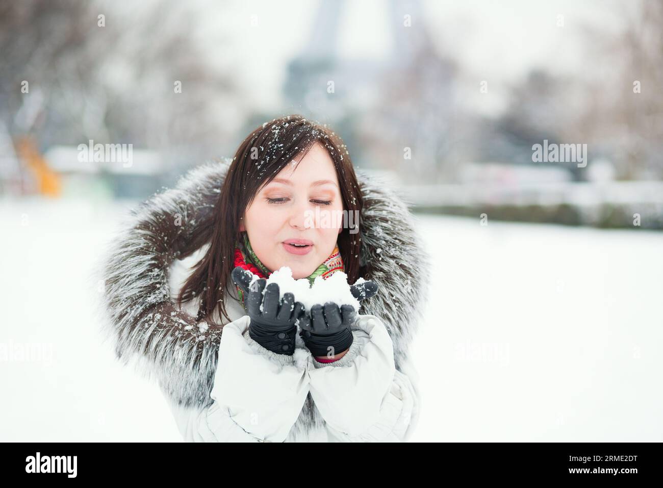 Girl blowing snow hi-res stock photography and images - Alamy