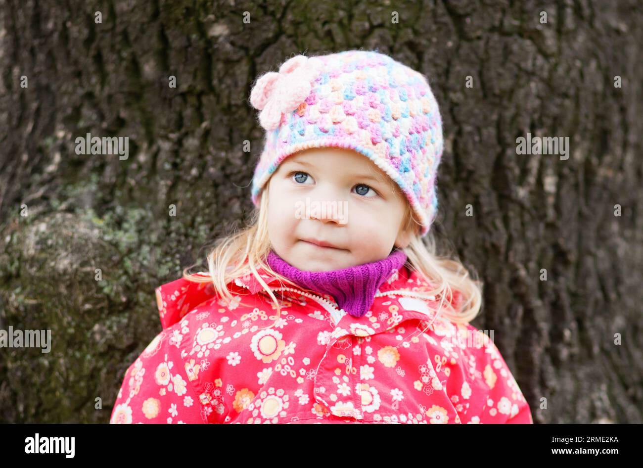 Dreamy little girl outdoors by fall Stock Photo - Alamy