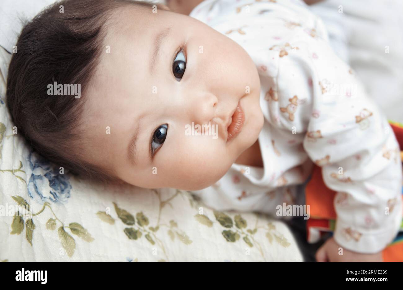 Toddler boy laying on bed hi-res stock photography and images - Alamy