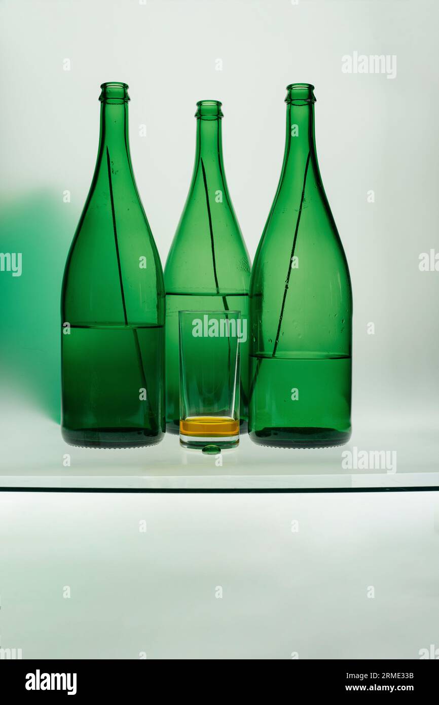 three green water bottles Stock Photo - Alamy