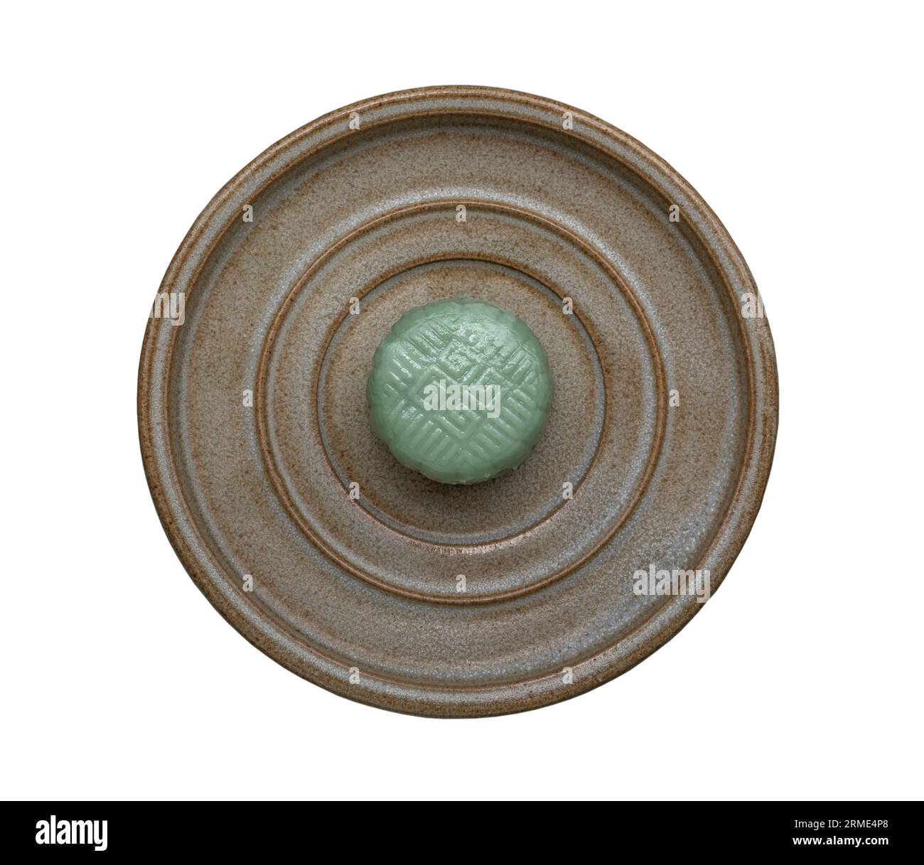 Delicious green mooncake is filled with taro, black sesame and golden ...