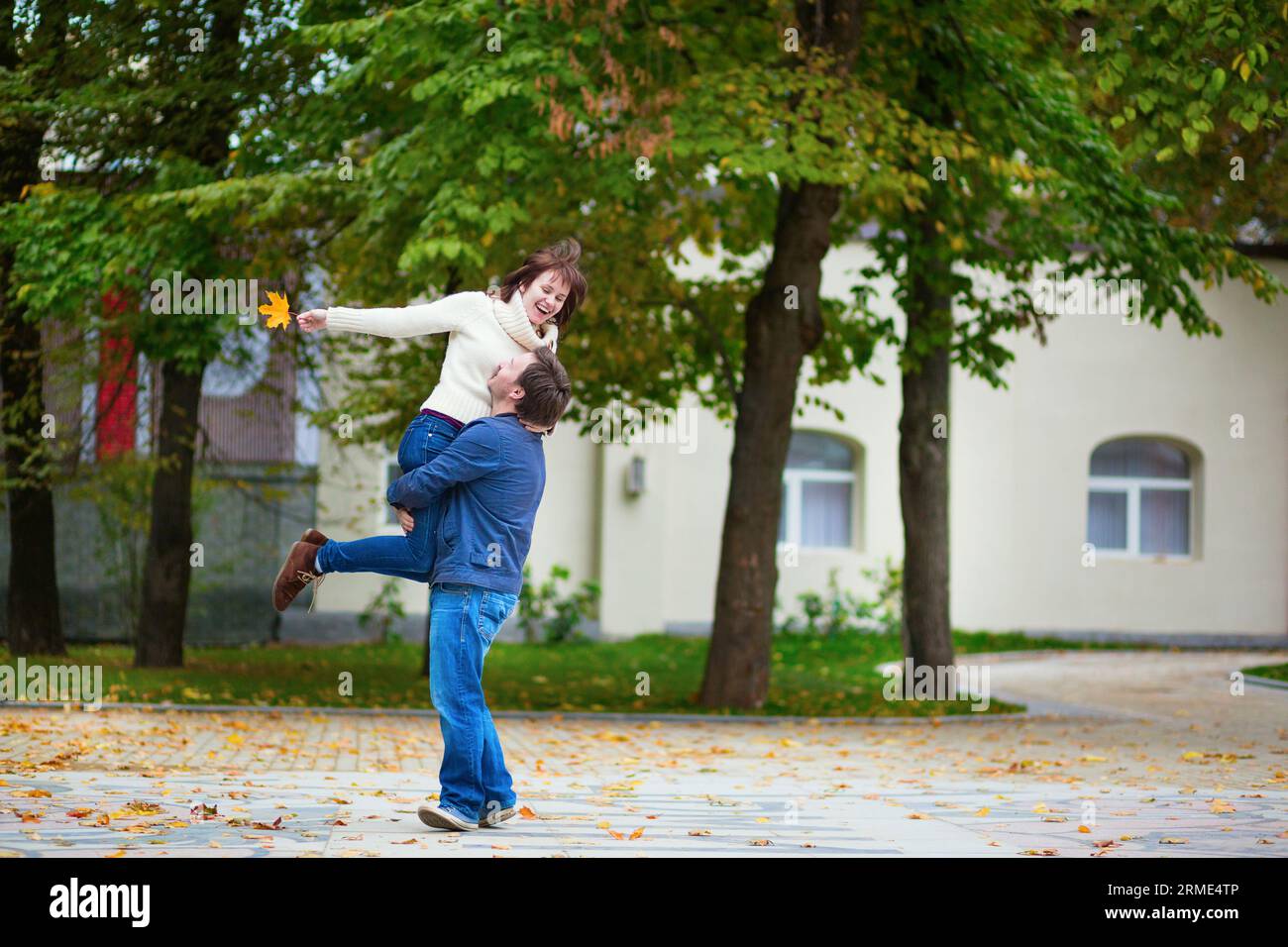Cheerful couple on bright white hi-res stock photography and images - Alamy