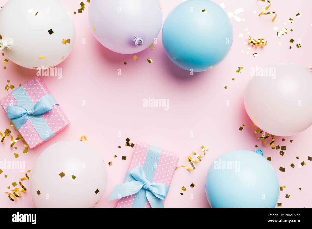 Flat lay party decoration concept on pastel colored background from ...