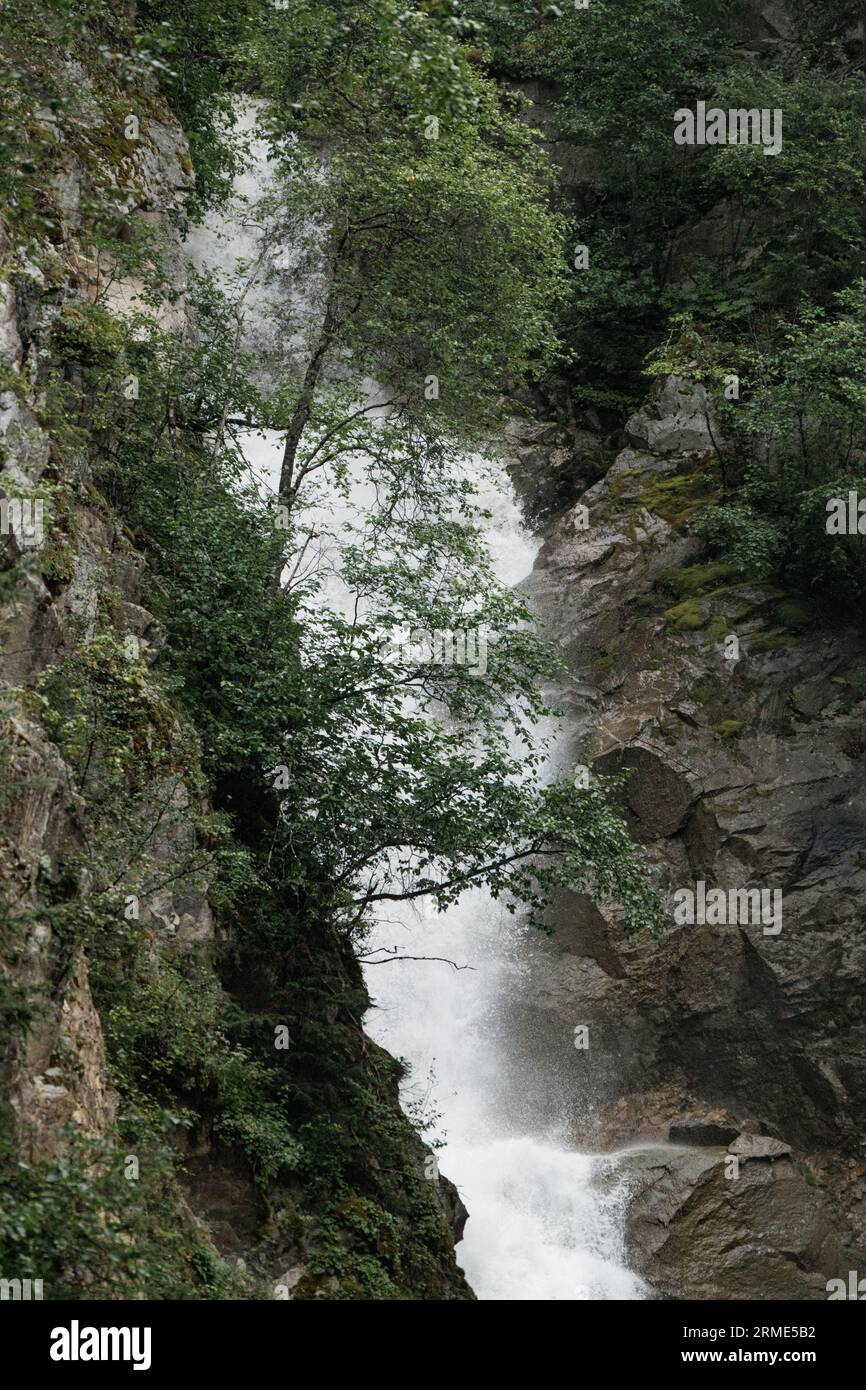 Large waterfall carved into a mountain side Stock Photo - Alamy