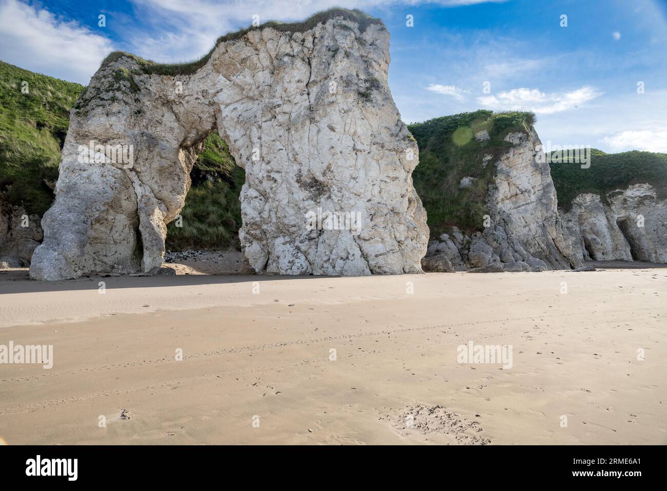 Arch in a stack, White Rocks cliff path, Portstewart Strand, (beach ...