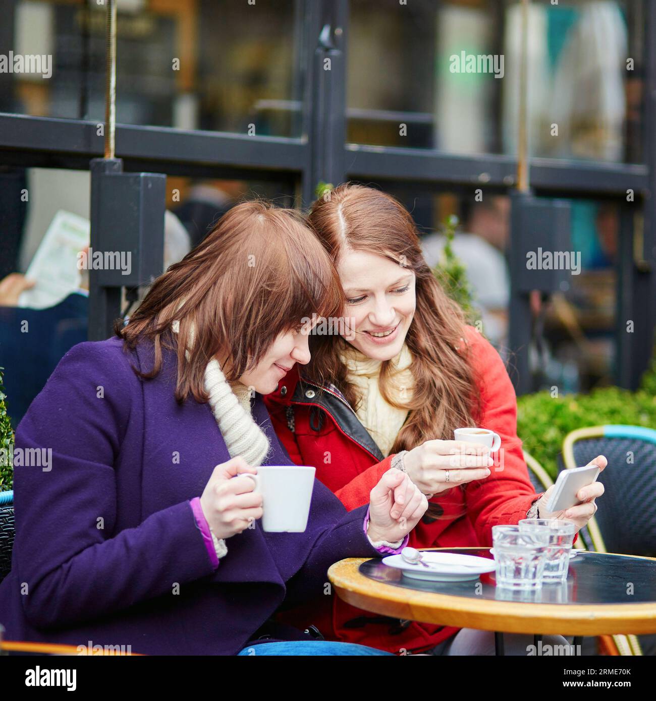 Girl in cafe talking friend hi-res stock photography and images - Alamy