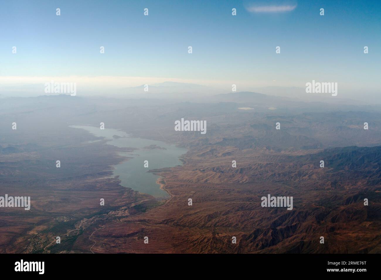 Large body of water in a rocky landscape viewed from high altitude ...