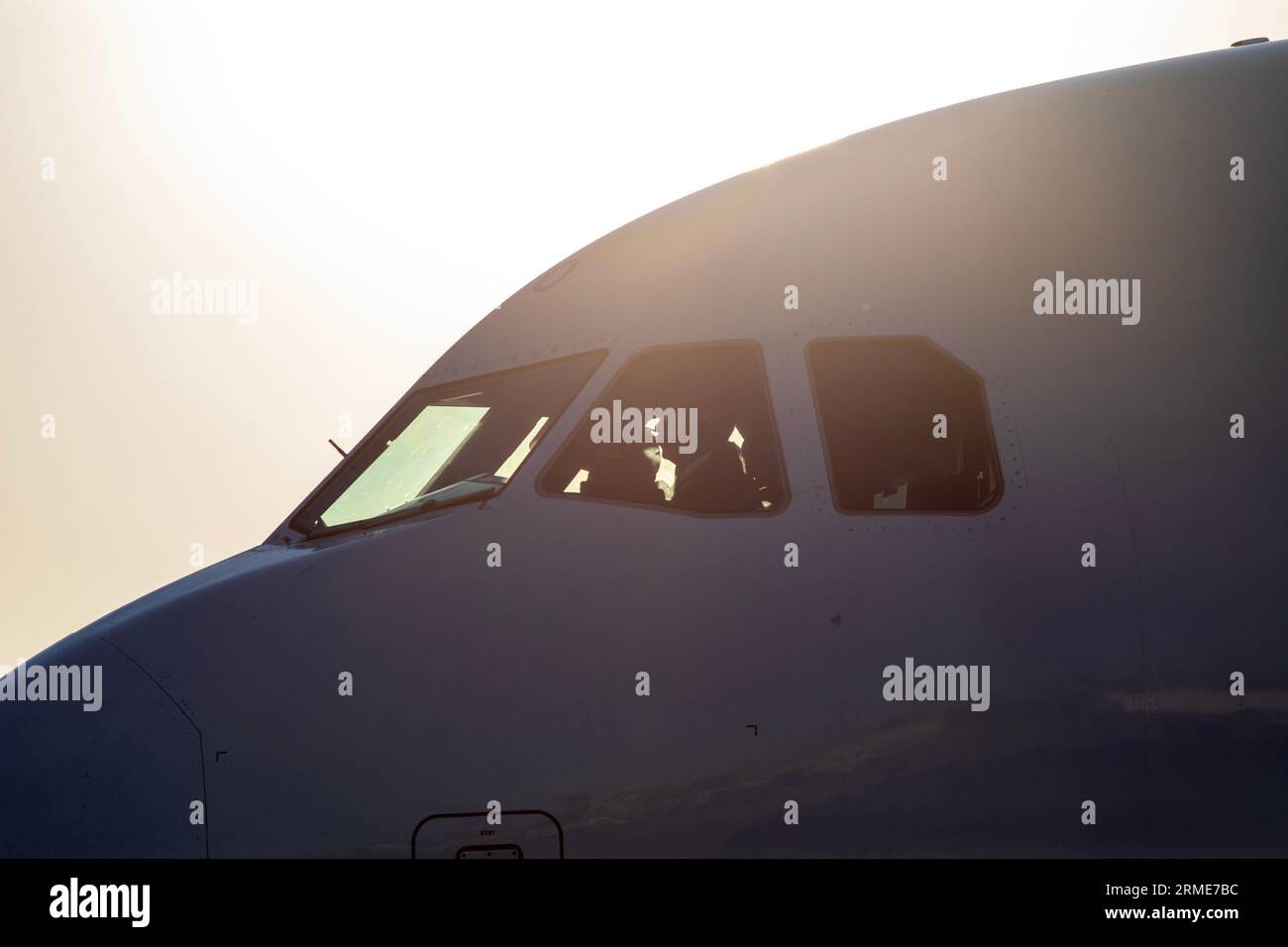 Close up view of commercial airplane cockpit crew inside Stock Photo ...