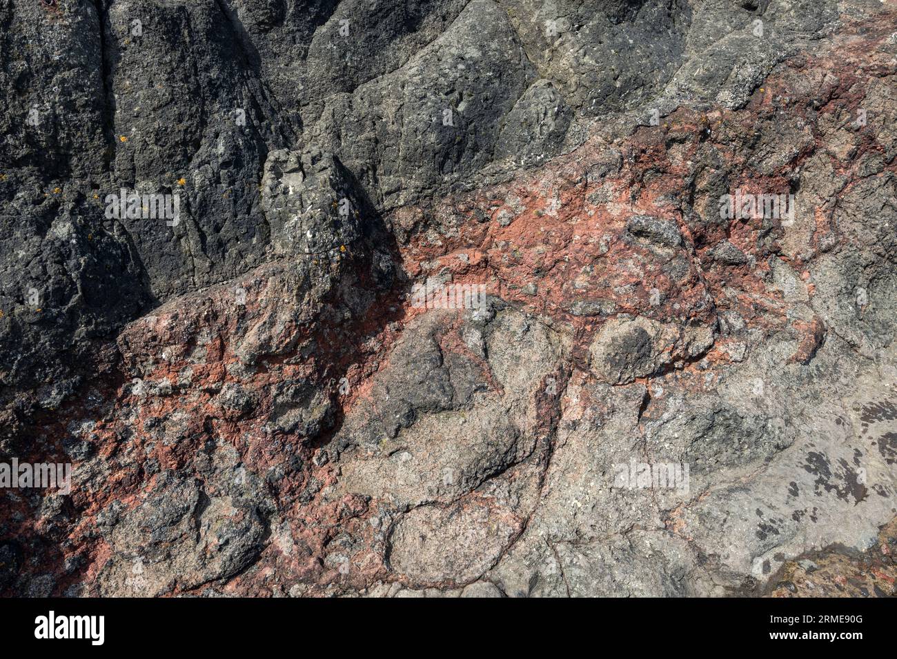 Red bands of laterite rock, Iron deposists from burnt vegetation ...