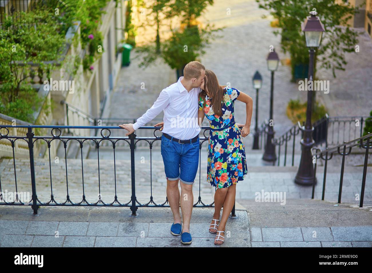 Romantic girl kissing boyfriend hi-res stock photography and images - Alamy