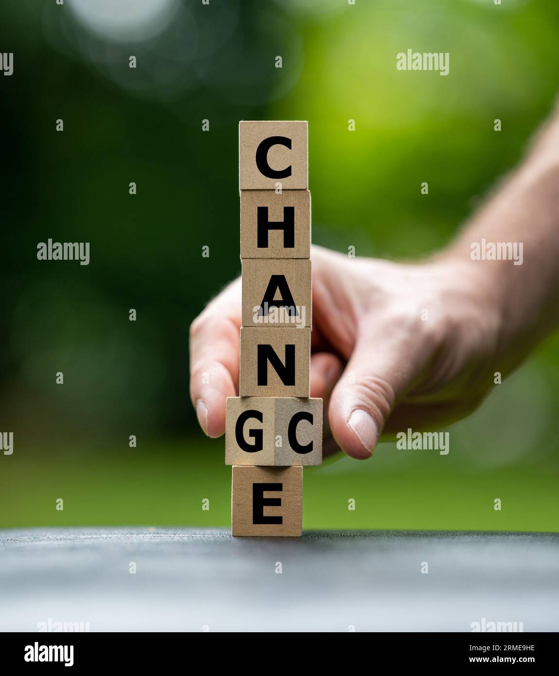 A stack of cubes form the words change and chance Stock Photo - Alamy