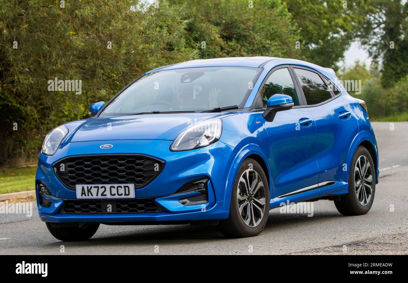 Whittlebury,Northants,UK -Aug 26th 2023: 2022 blue Ford Puma car travelling on an English ...