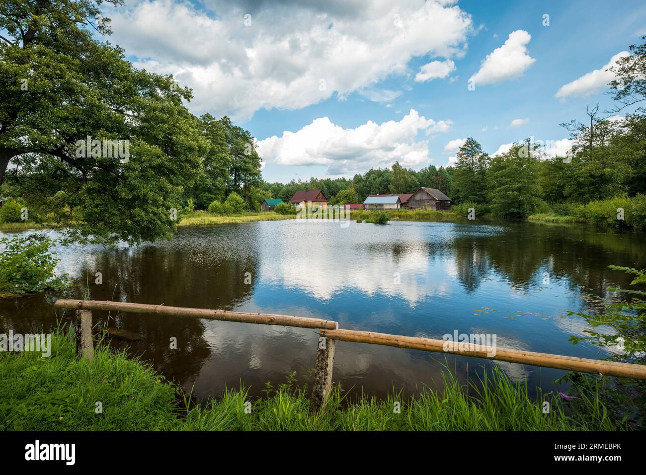 Beautiful rural landscape. A small settlement by the lagoon surrounded ...