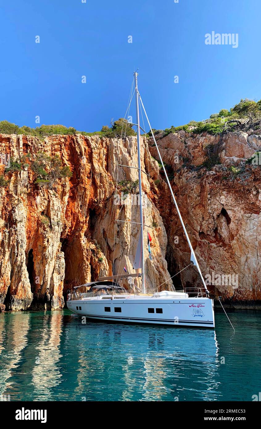 A Hanse 548 sailing yacht anchored at Red Rocks, Otok Hvar, Croatia ...