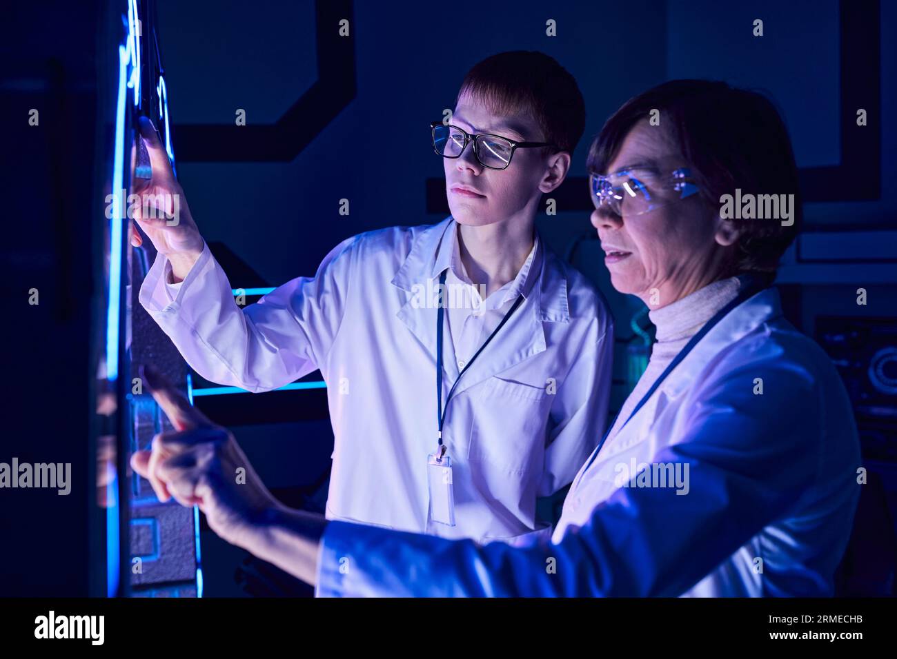 science of future, woman scientist and young intern operation ...