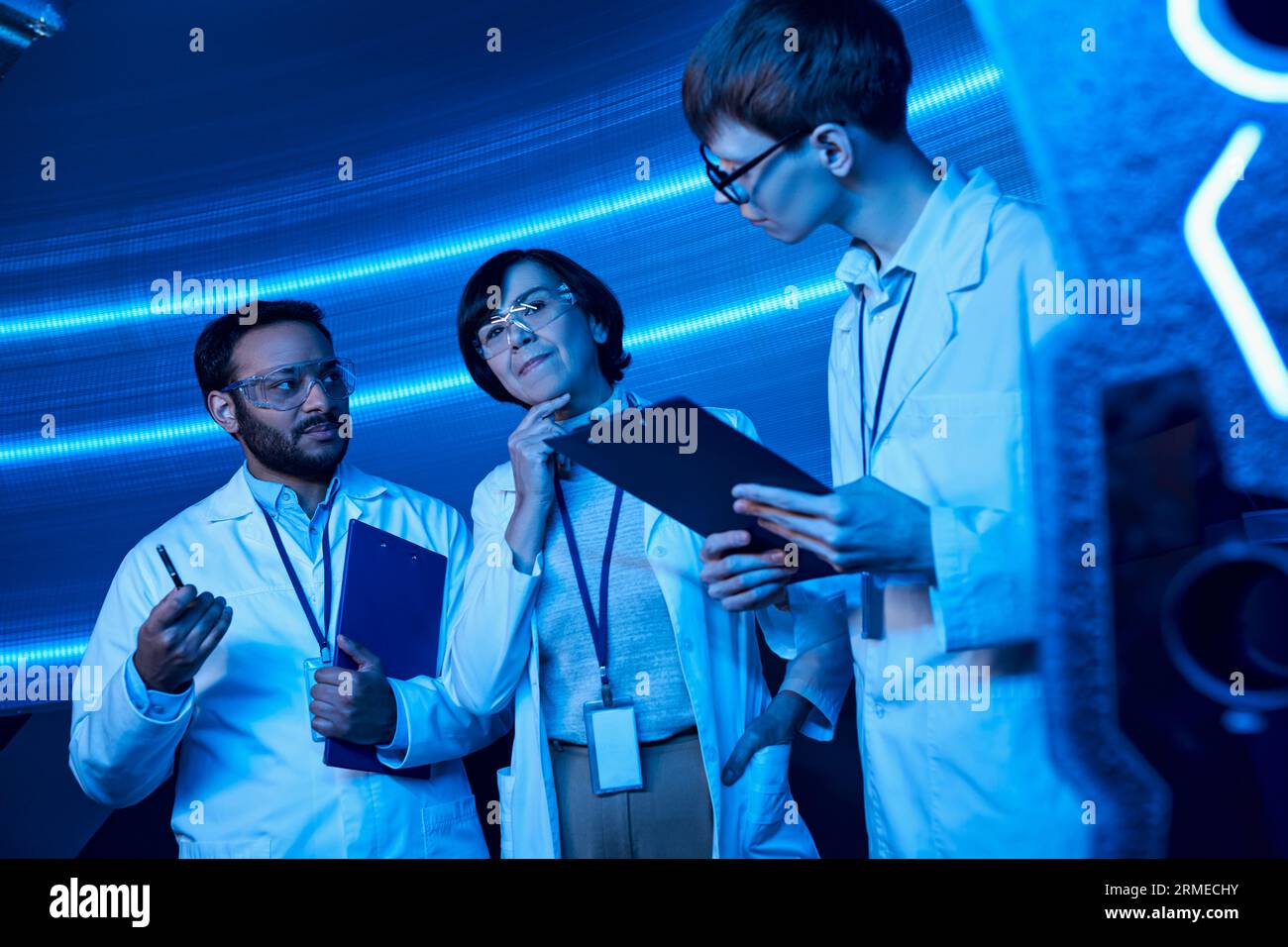 innovation hub, multiethnic scientists working on invention in ...