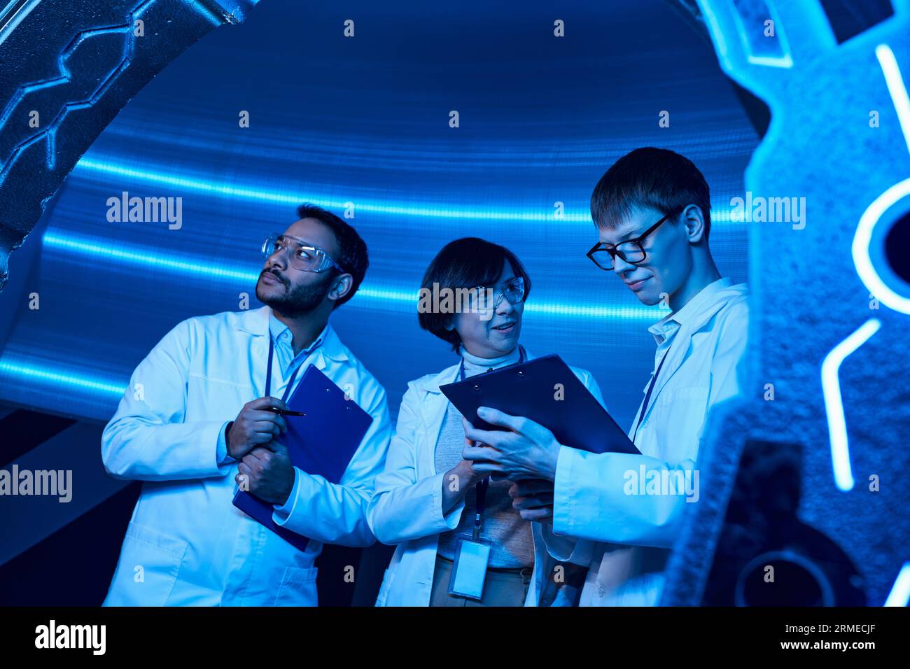 creative teamwork, indian scientist thinking on invention near talking ...