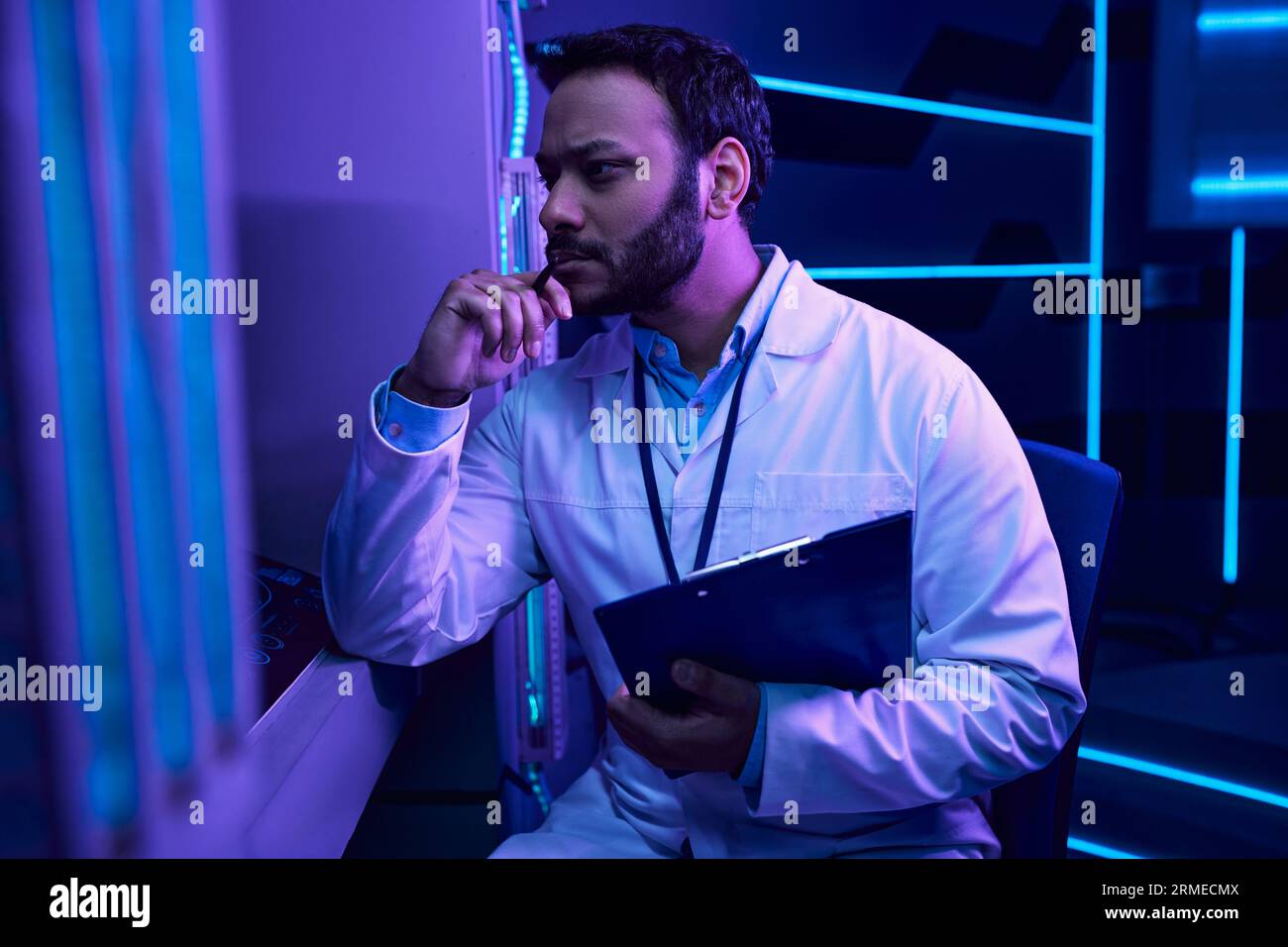 Futuristic Reflections: Indian Male Scientist Contemplates Amid Neon ...