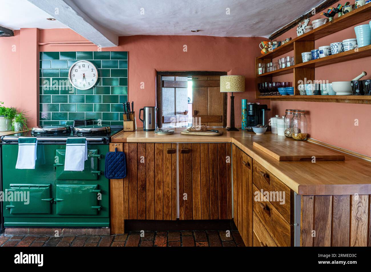 Original Aga and tiled splashback with beech worktop and original hatch ...