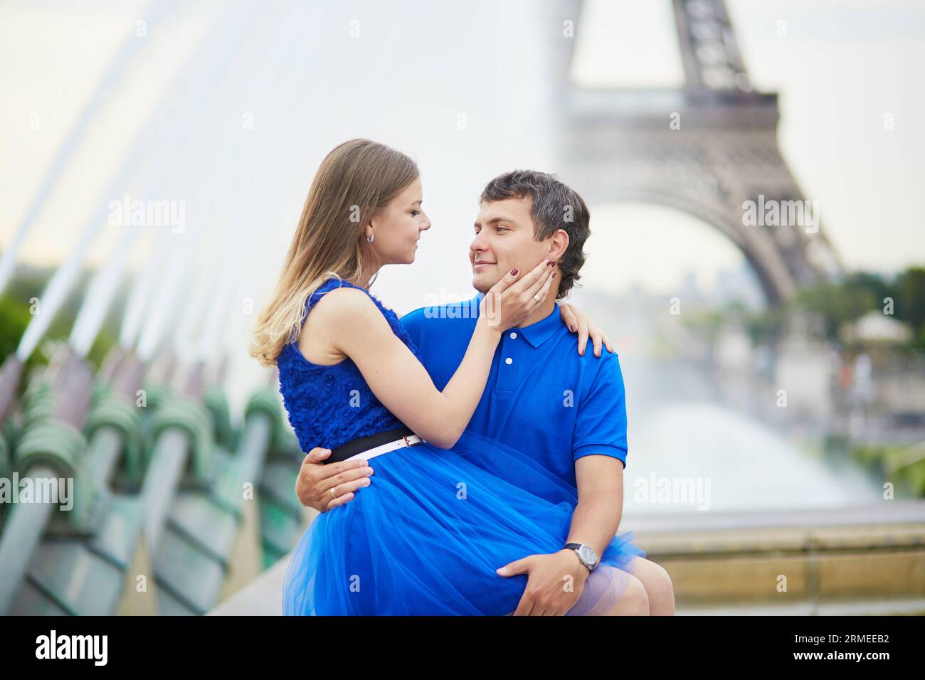Romantic dating couple on Trocadero viewpoint in Paris, sitting near a ...