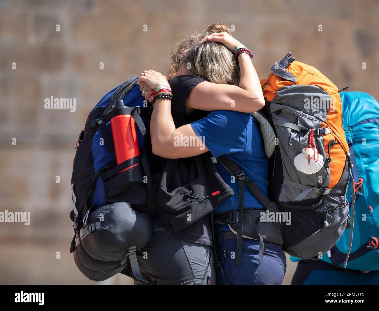 Pilgrims on the Camino de Santiago arrive at the Plaza del Obradoiro ...