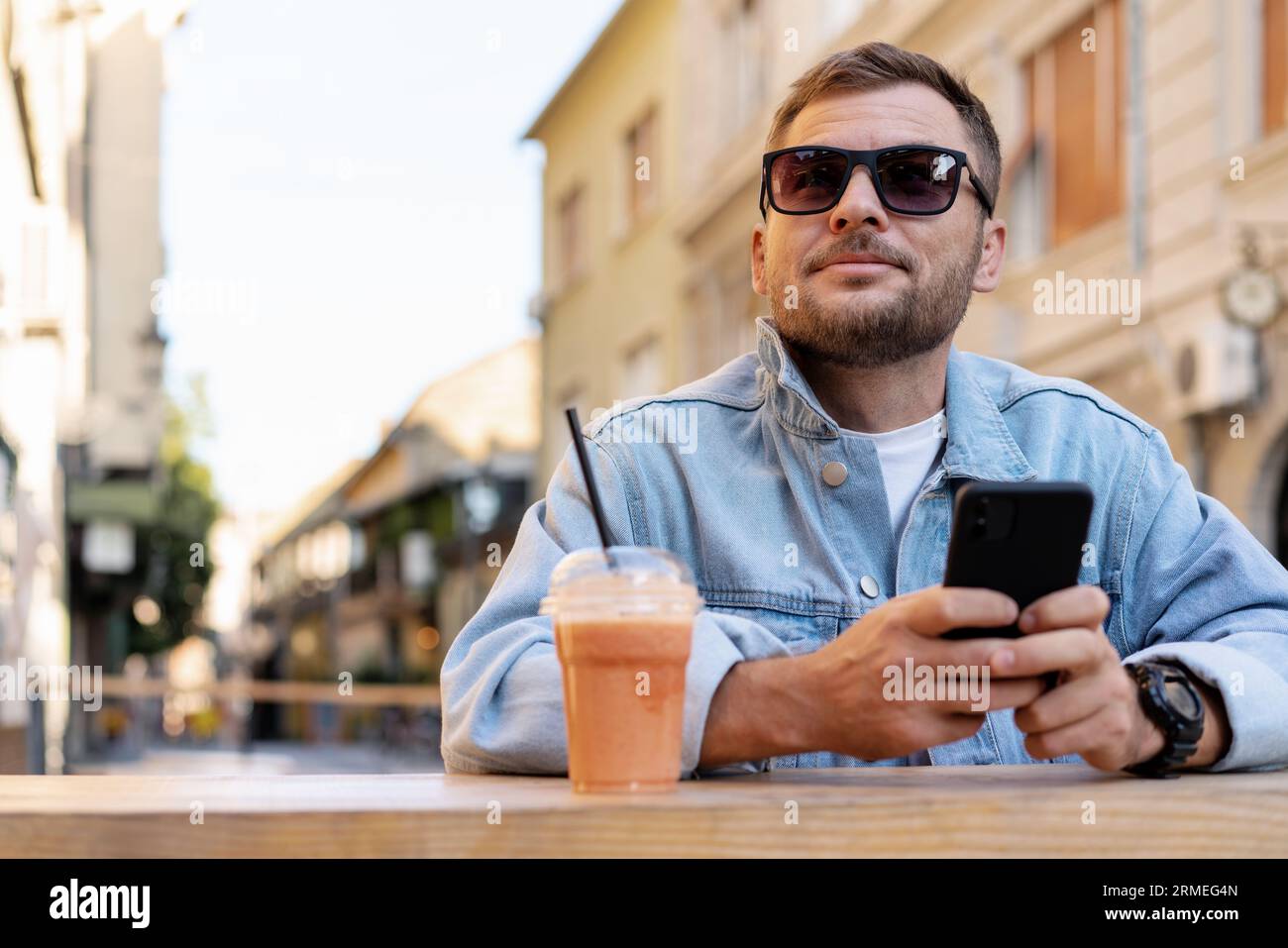 Attractive handsome man in cafe hi-res stock photography and images - Alamy