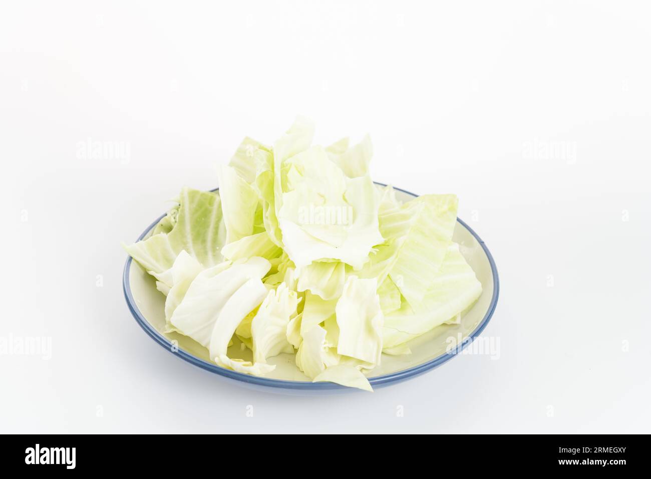 Hand torn cabbages hi-res stock photography and images - Alamy