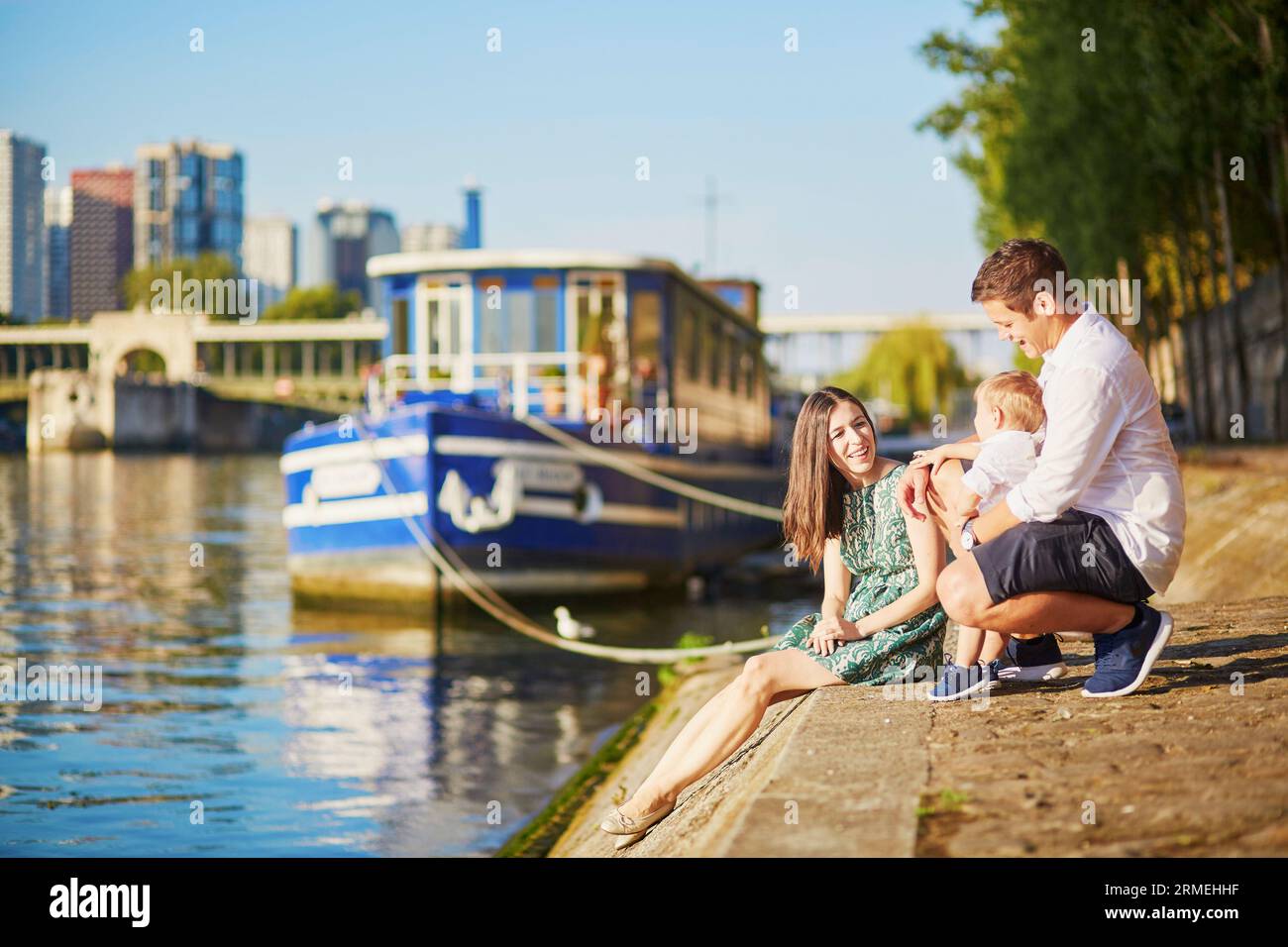 Happy family of three enjoying their vacation in Paris, France Stock ...