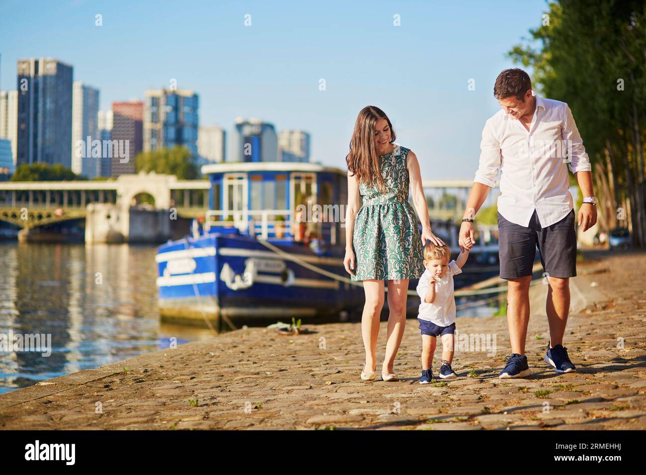 Happy family of three enjoying their vacation in Paris, France Stock ...