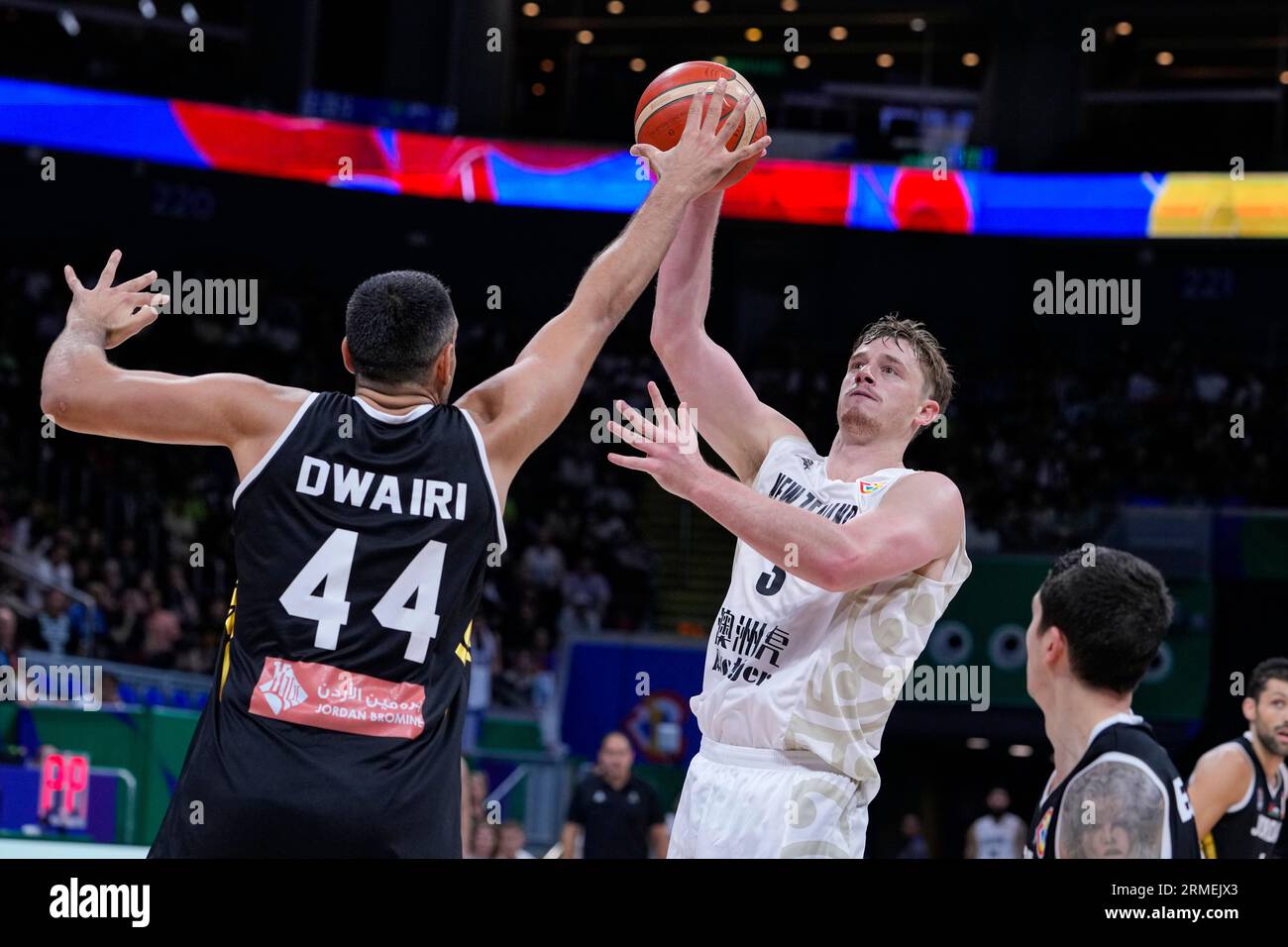 New Zealand forward Finn Delany (3) shoot over Jordan center Ahmad ...