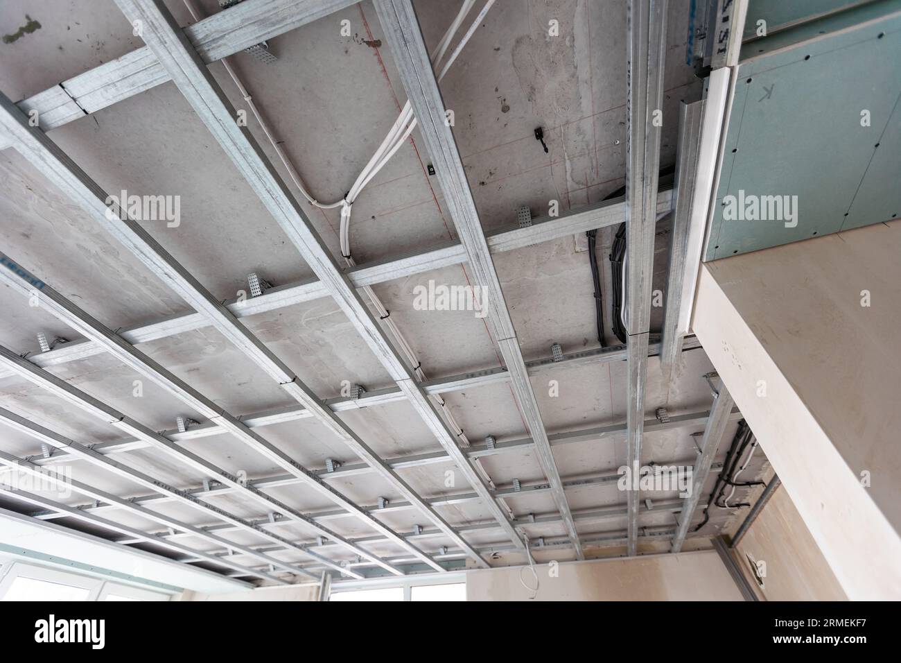 Worker repair hole in ceiling hi-res stock photography and images - Alamy
