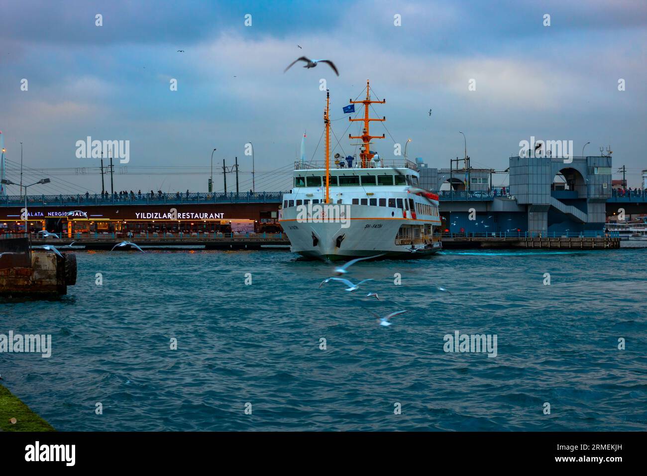 Famous ferries of Istanbul background photo. Ferry and Galata Bridge ...