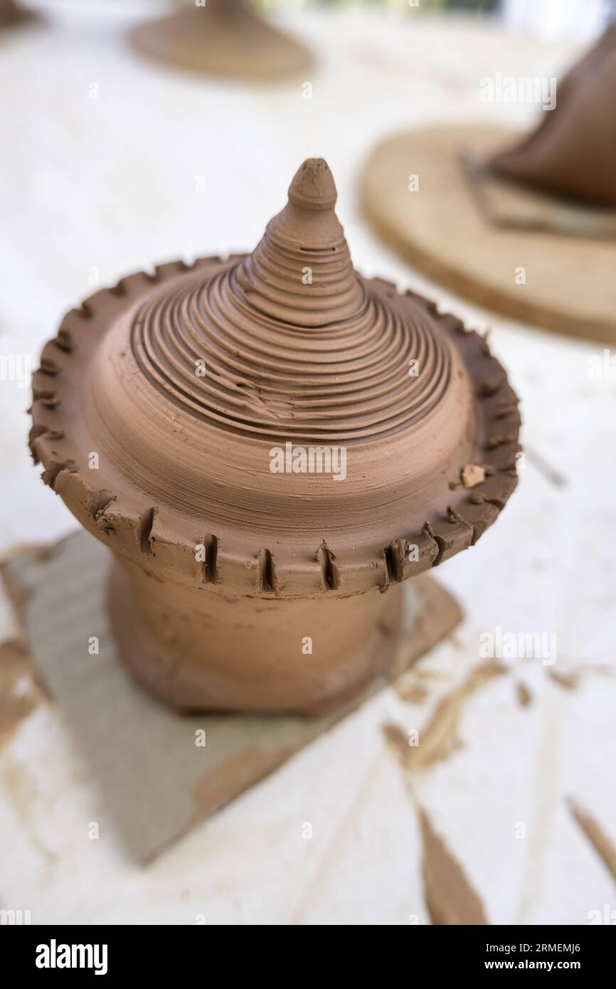 Detail of handmade clay figure, handicraft Stock Photo - Alamy