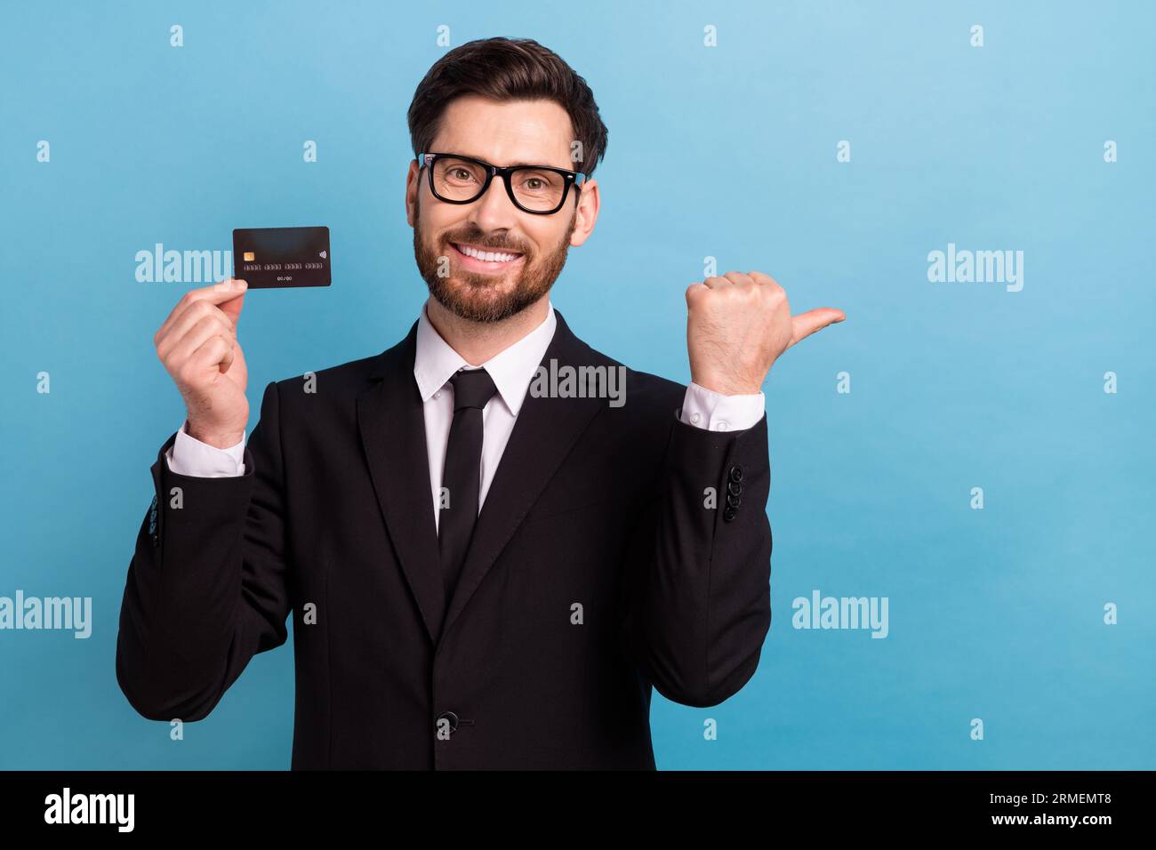 Photo of positive happy banker wear black tuxedo spectacles rising ...