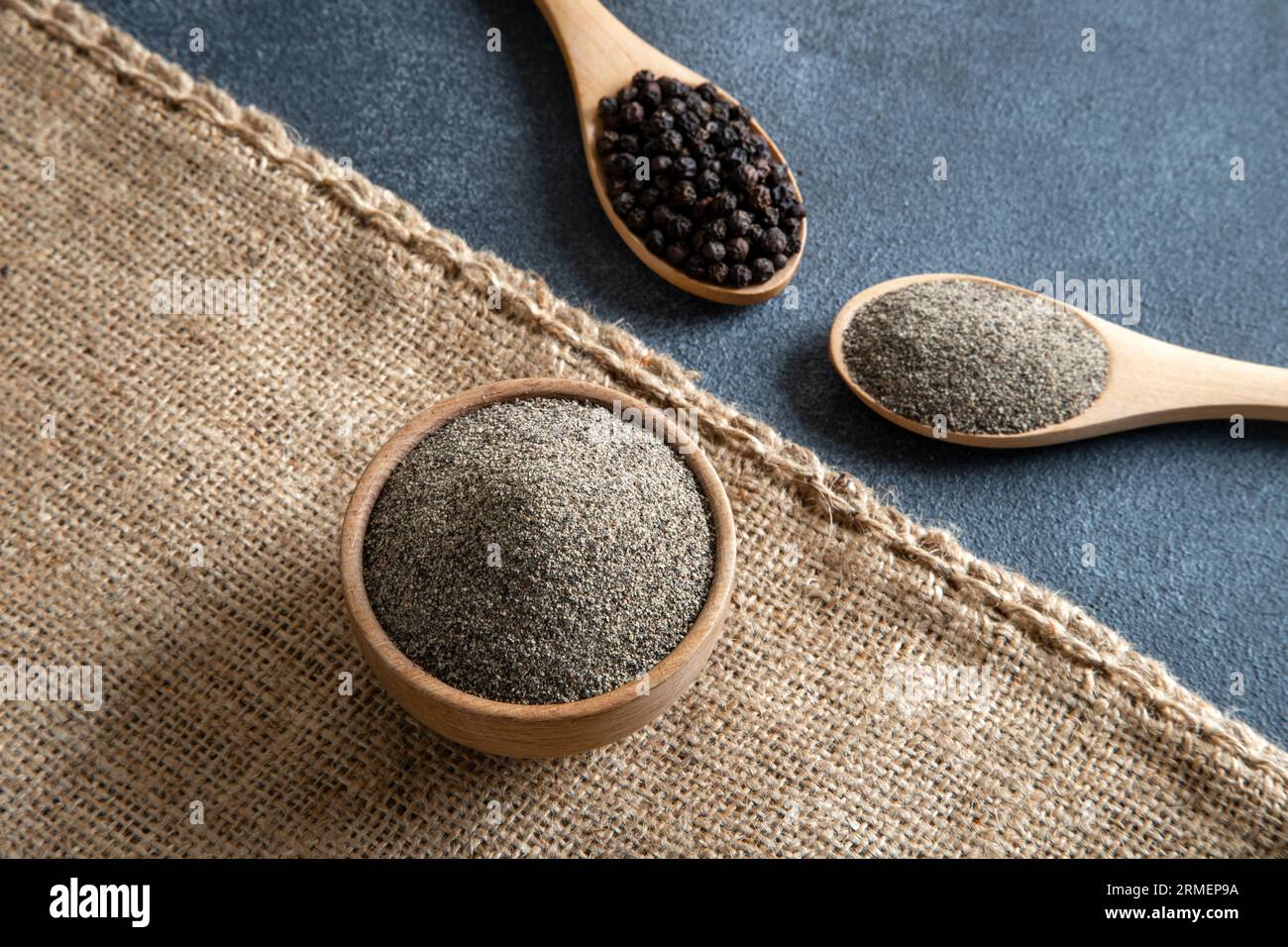 Ground black pepper with grains of black pepper,top view Stock Photo ...