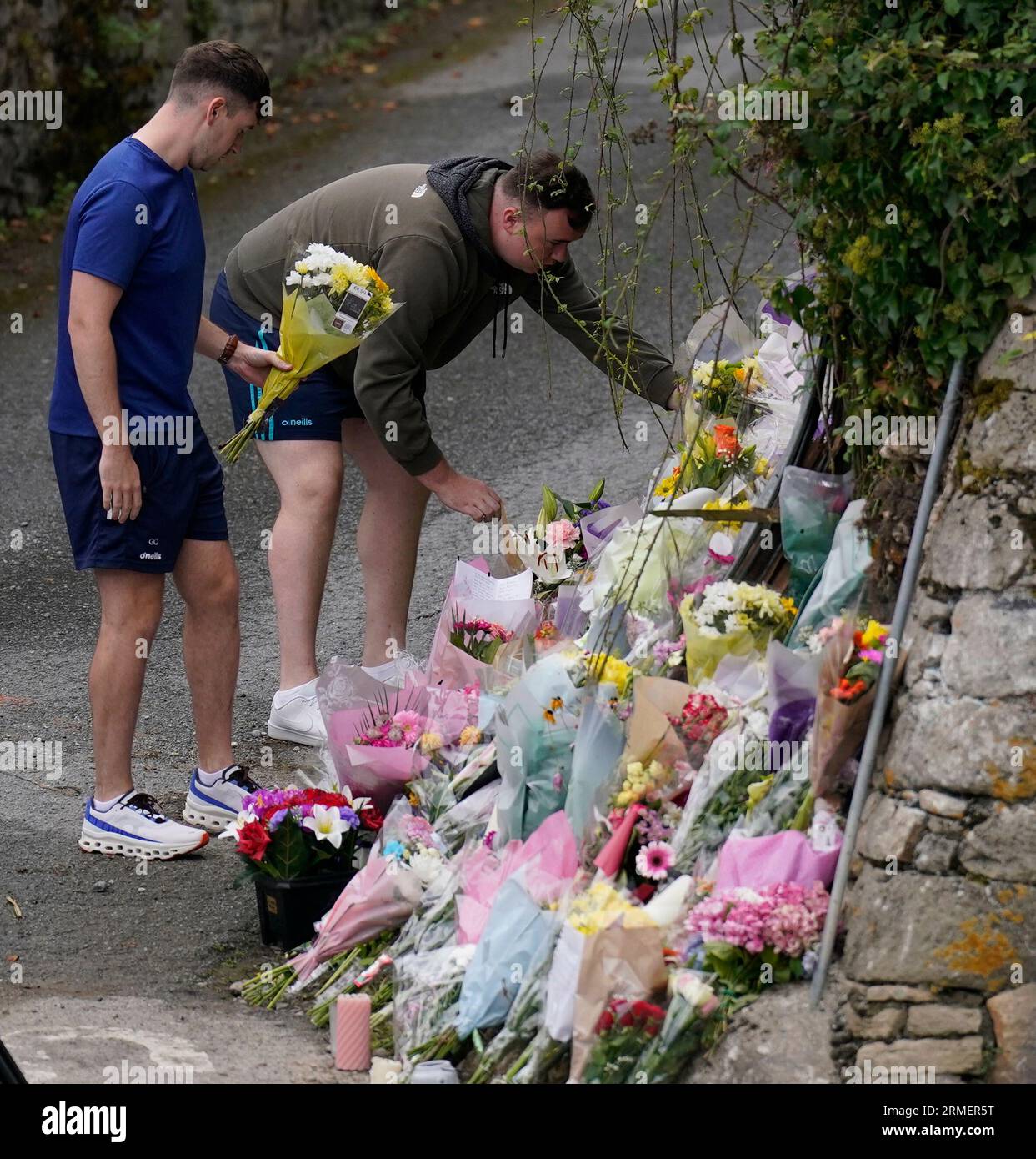 People lay tributes at the scene of a crash, in memory of Luke ...
