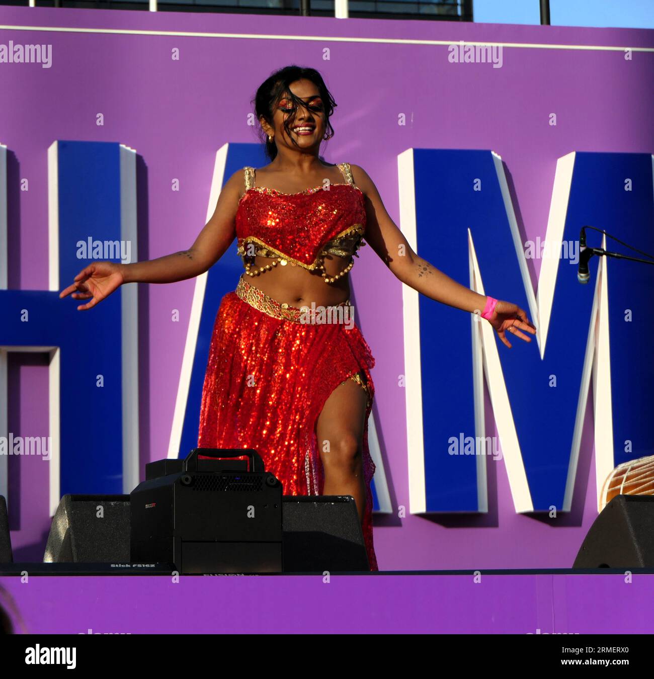 Belly Dancing in Red dress,at Birmingham festival 2023 Stock Photo - Alamy
