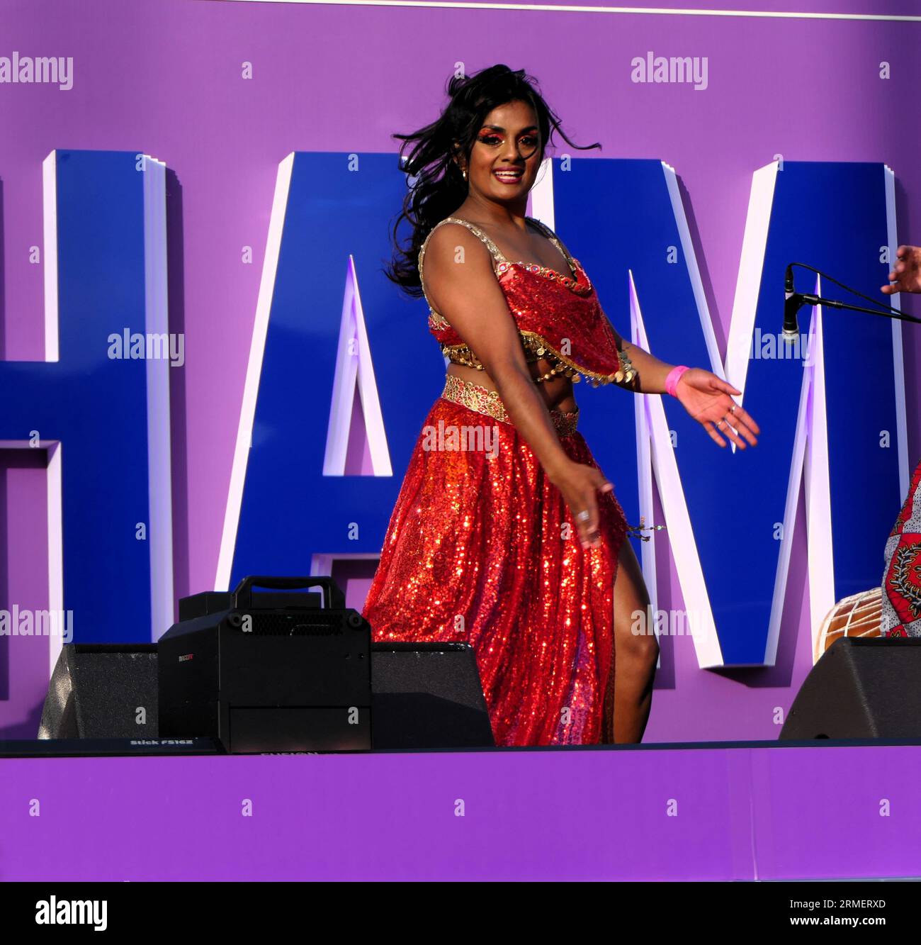 Belly Dancing in Red dress,at Birmingham festival 2023 Stock Photo - Alamy