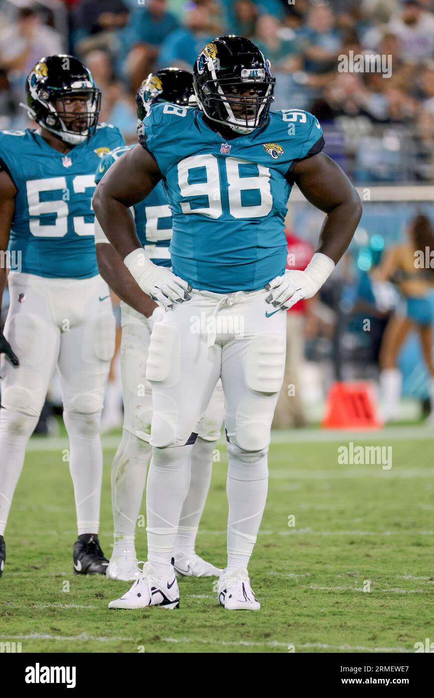 Jacksonville Jaguars defensive end Michael Dogbe (98) looks to the ...