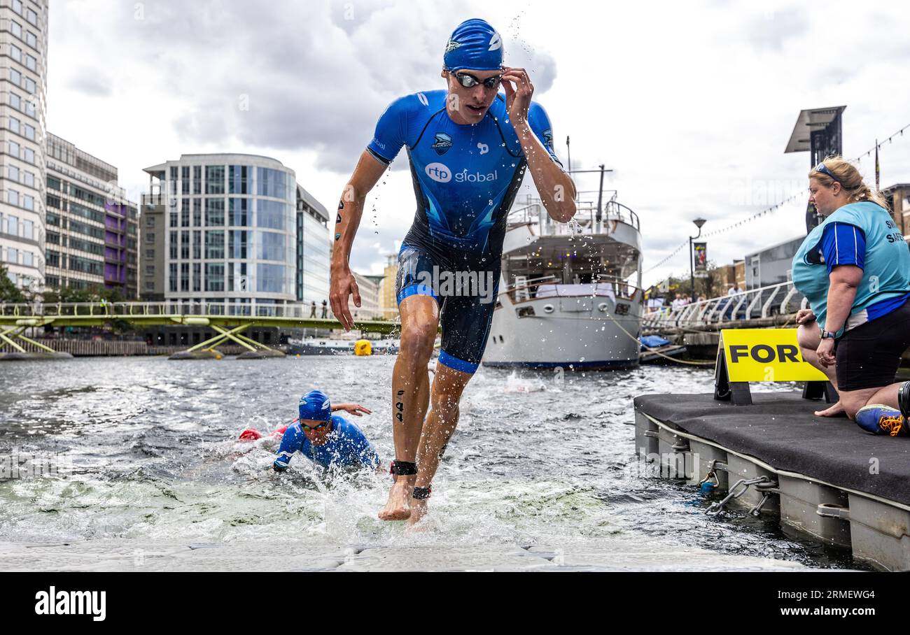 Max Stapley emerges from the water as he competes in the men's race ...