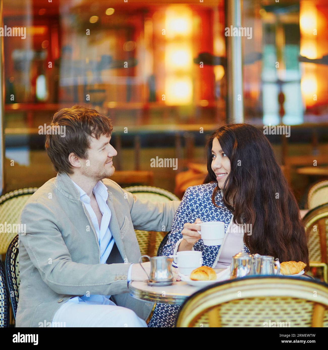 Romantic couple in outdoor cafe in Paris, France Stock Photo - Alamy