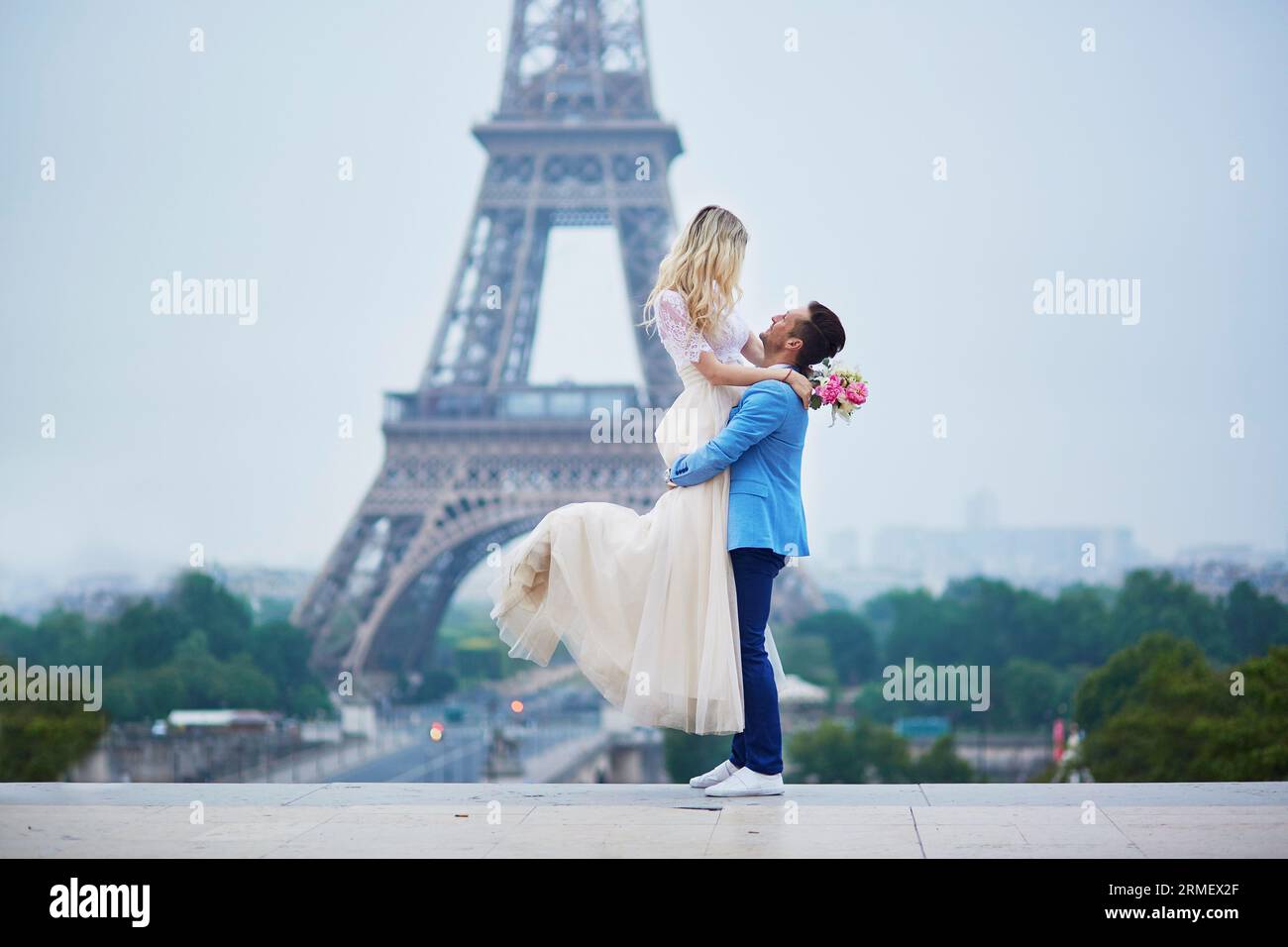 Just married couple in Paris, France. Beautiful young bride and groom ...