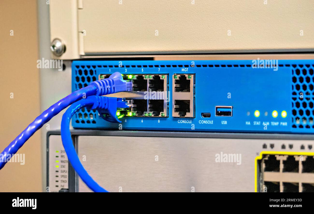 Communication equipment connected with blue copper cables Stock Photo ...