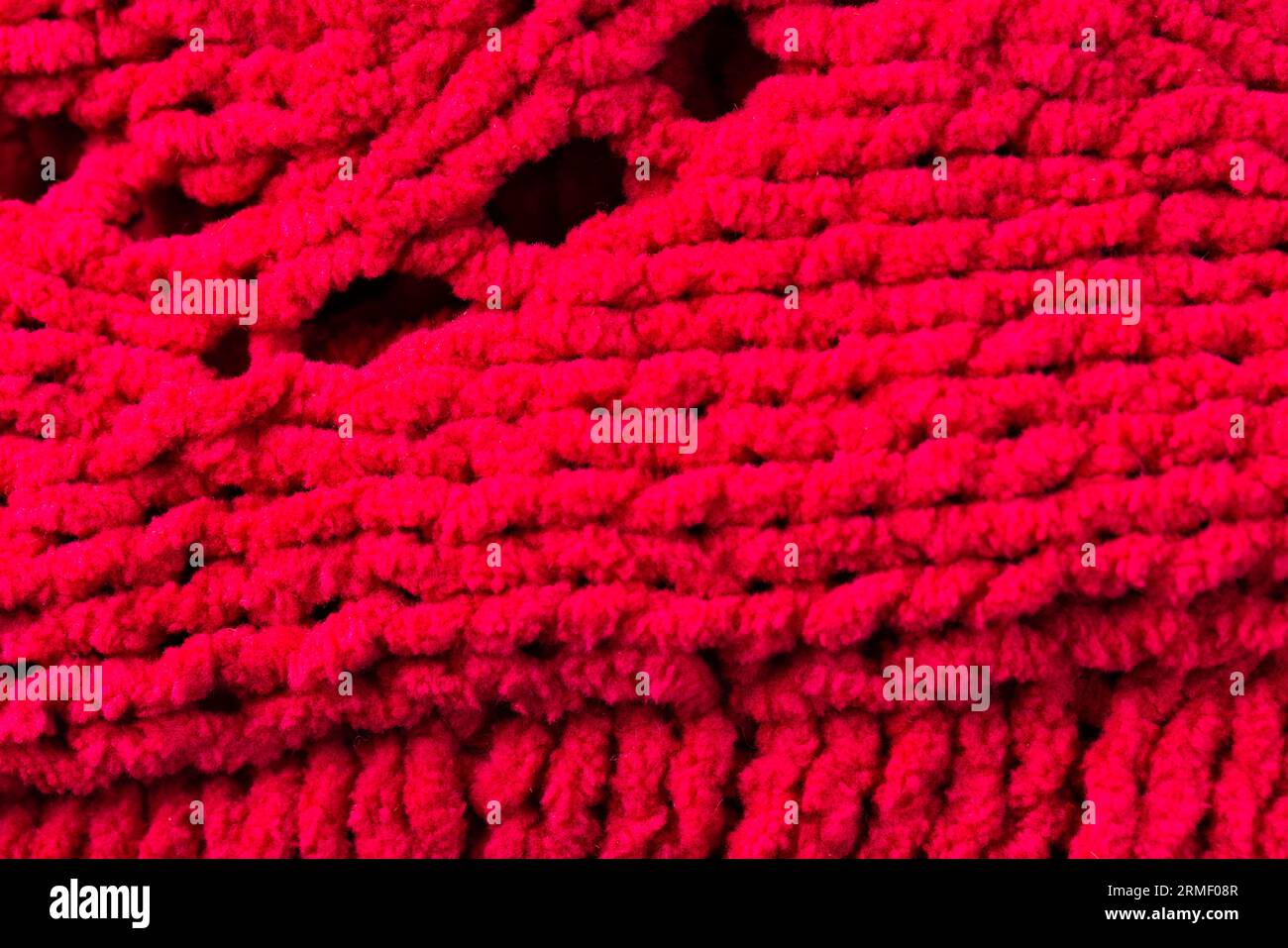 Micro close up of pink wooly crochet fabric with copy space Stock Photo ...
