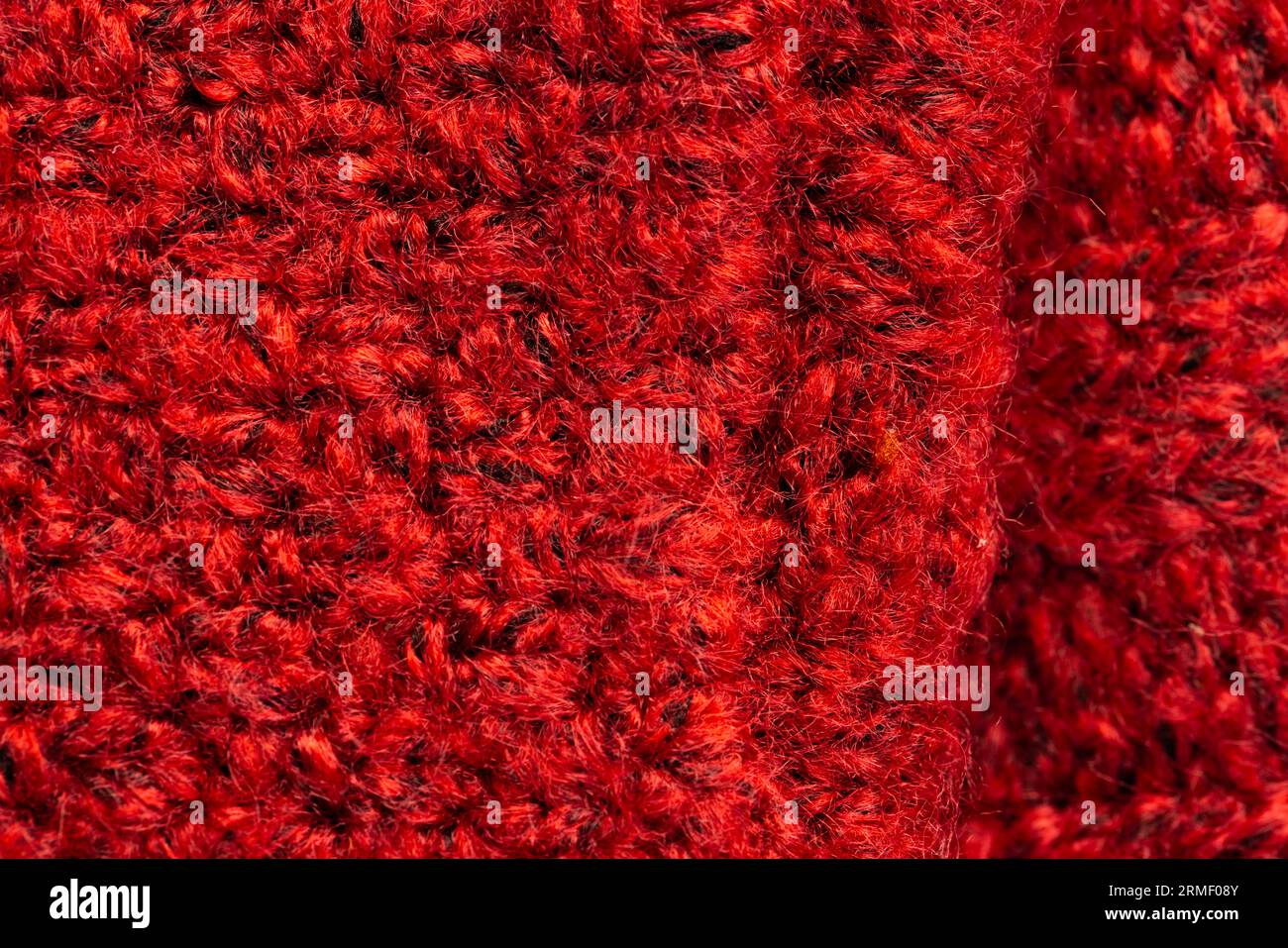 Micro close up of red wooly crochet fabric with copy space Stock Photo ...