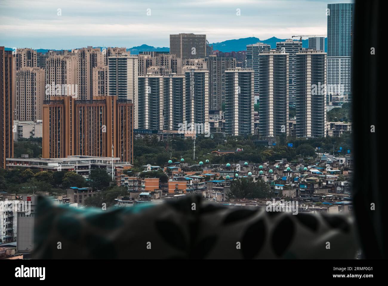 Chengdu, China - 28th August 2023: View through window of blocks and ...