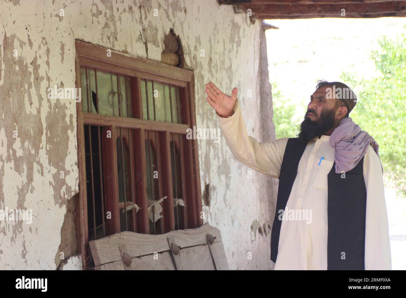 Nangarhar, Afghanistan. 30th July, 2023. A man shows the damage of a ...