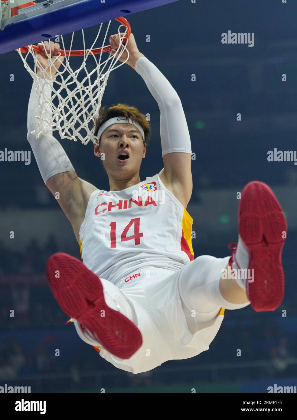Manila, Philippines. 28th Aug, 2023. China's Wang Zhelin dunks during ...