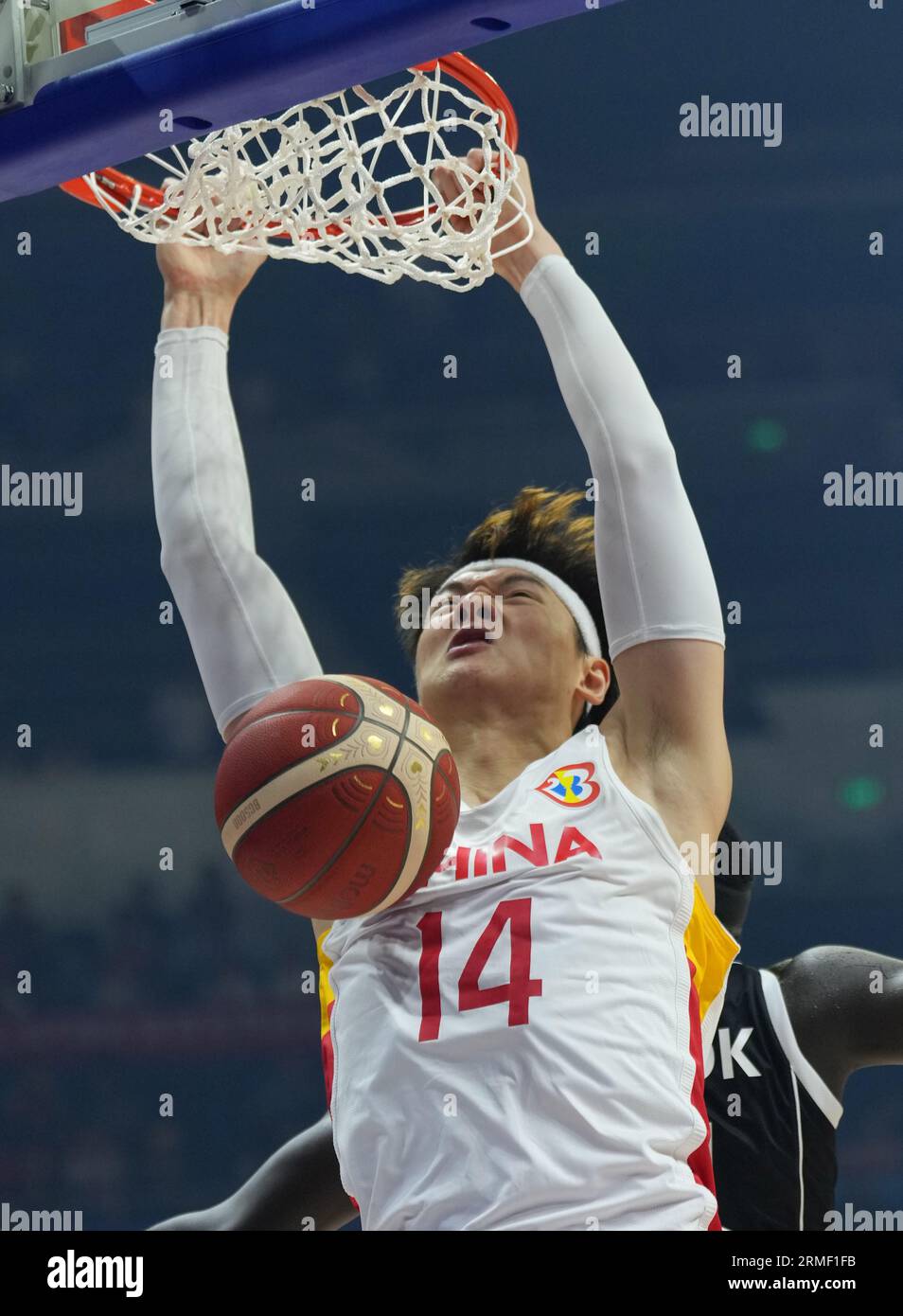 Manila, Philippines. 28th Aug, 2023. China's Wang Zhelin dunks during ...